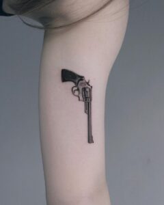 Fierce Ink: Unleashing the Bold Beauty and Meaning Behind Gun Tattoos