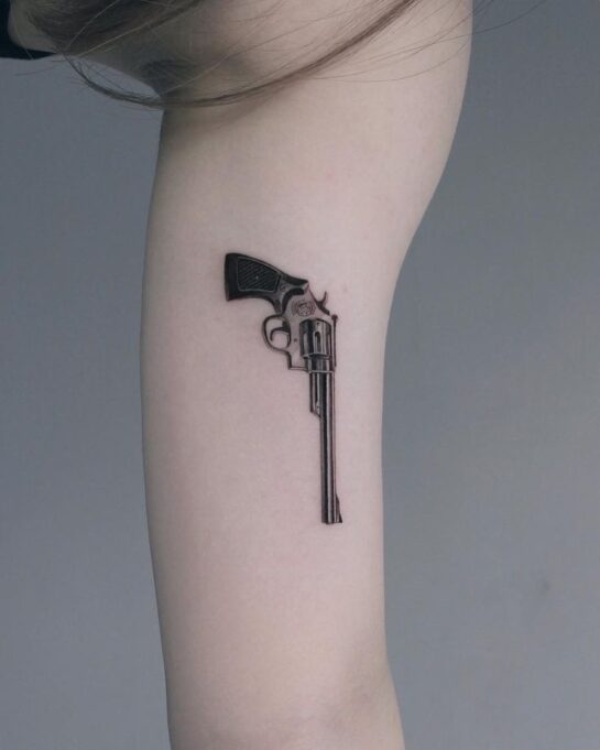 Fierce Ink: Unleashing the Bold Beauty and Meaning Behind Gun Tattoos